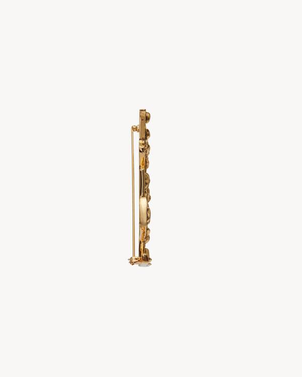 CASSANDRE crocodile brooch in metal | Saint Laurent | YSL.com