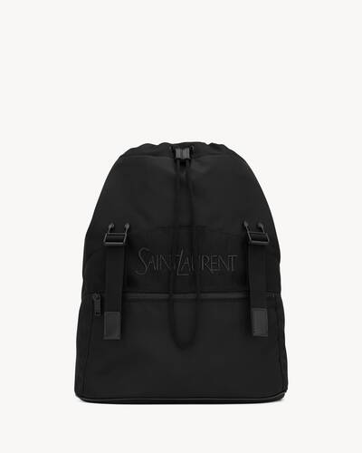 SAINT LAURENT backpack in ECONYL® and vegetable-tanned leather | Saint ...