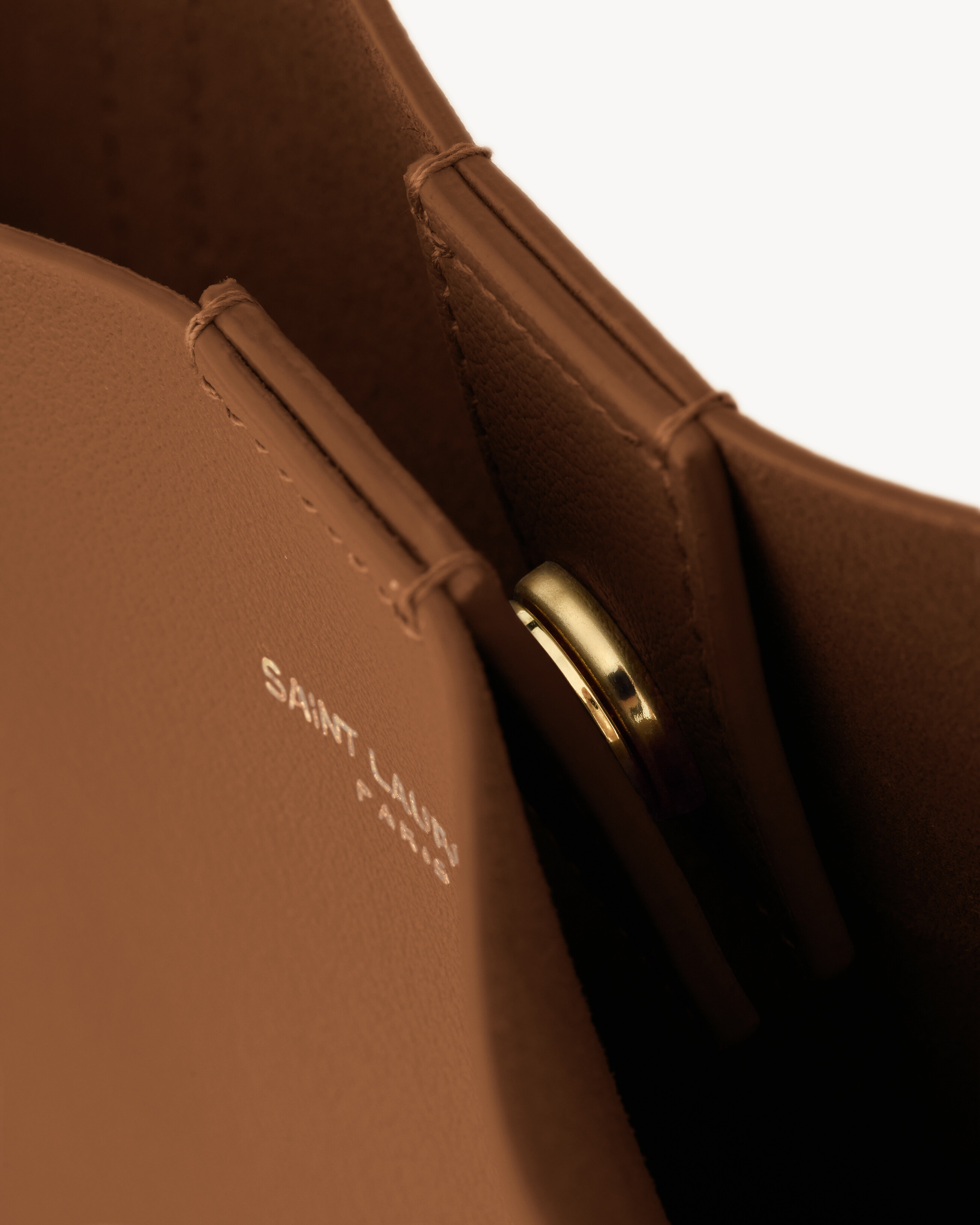 SHOPPING SAINT LAURENT IN LEATHER | Saint Laurent | YSL.com
