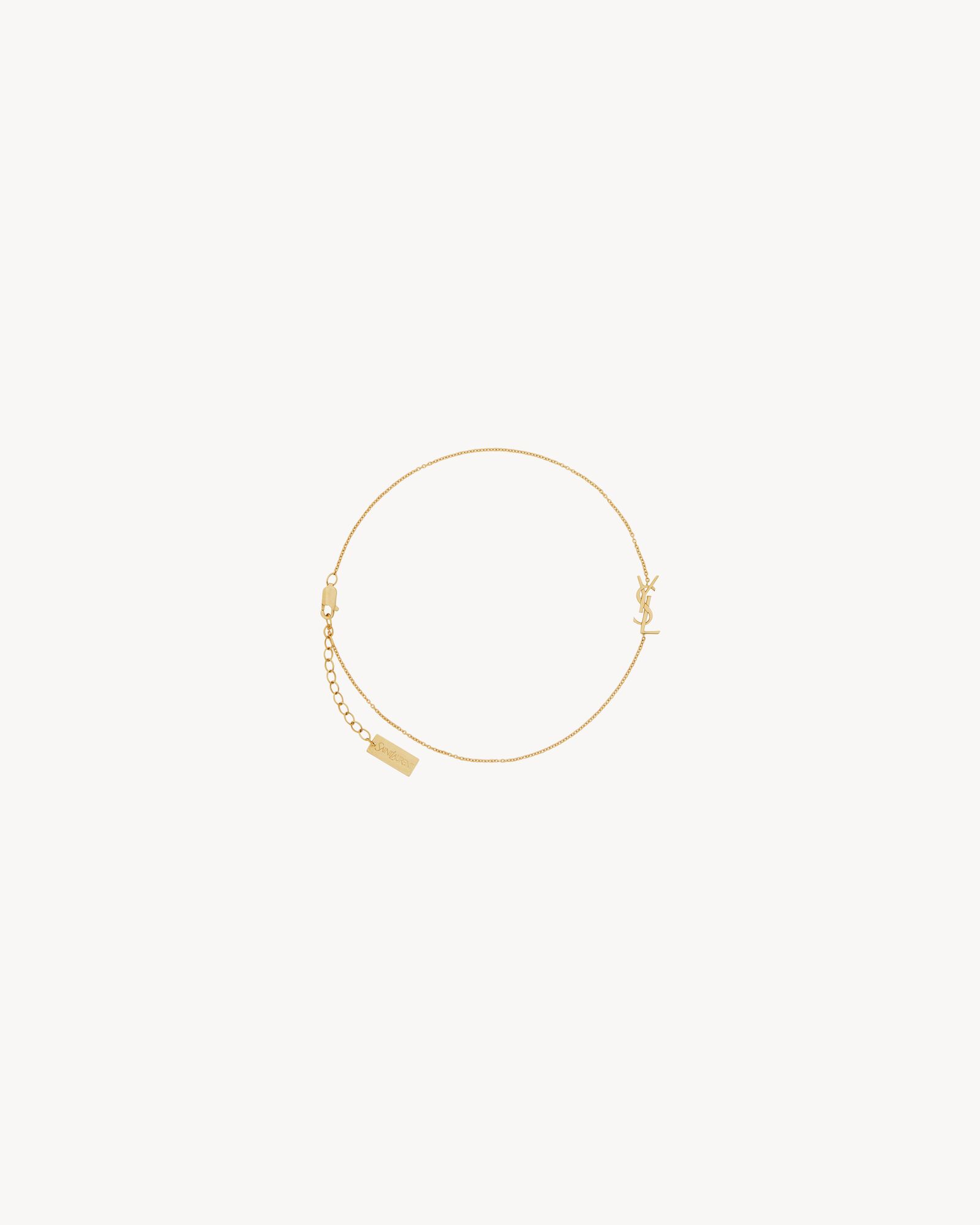 CASSANDRE ankle bracelet in 18K yellow gold | Saint Laurent | YSL US
